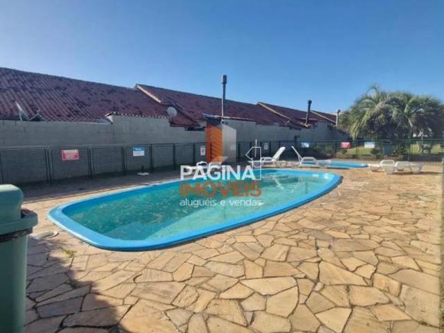 Página 1 Imóveis anuncia para venda, casa de 02 dormitórios, no Condomínio Reserva do Bosque no bair