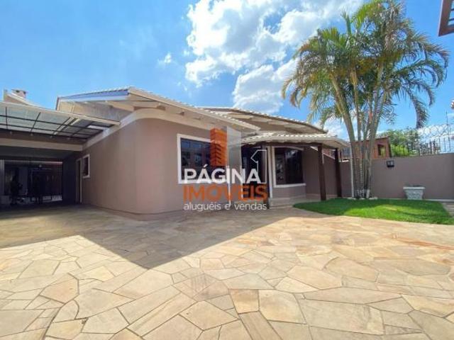 Página 1 Imóveis anuncia para venda, excelente casa ampla com piscina de 03 dormitórios no bairro Ma