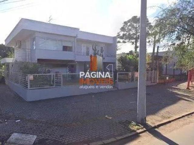 Página 1 Imóveis anuncia para venda linda casa de esquina com 04 dormitórios mobiliado, no bairro Ig