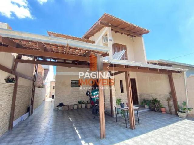 Página 1 Imóveis anuncia para venda ótima casa com piscina de 03 dormitórios, sendo 1 suíte, no bair