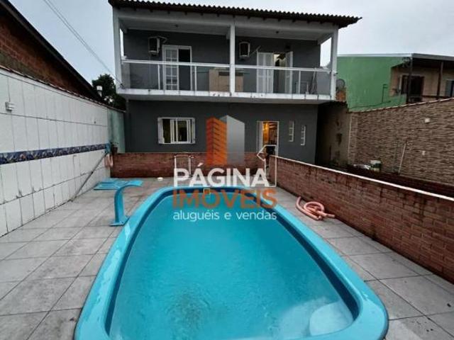 Página 1 Imóveis anuncia venda de casa com piscina e 4 dormitórios, sendo 1 suíte, no Bairro Harmoni