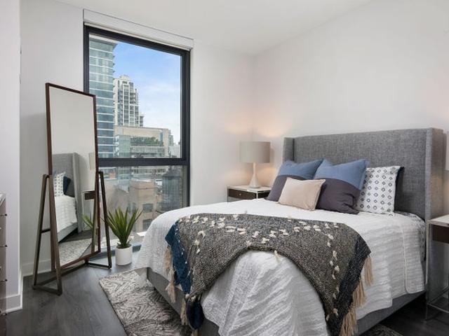 Partially furnished bedroom w/ private bath