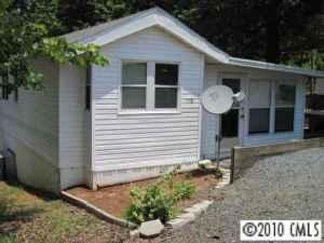 Park Model with Room Addition in Badin Shores Badin Lake for sale in Charlotte, North Carolina