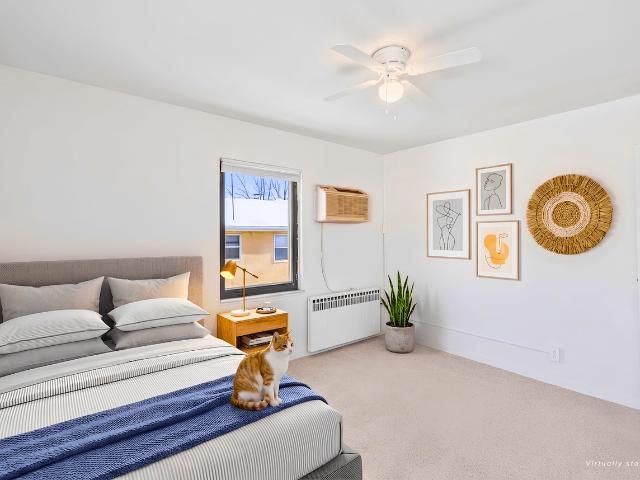 Park Point Properties 2 Bedroom Apartment for Rent at 4300 Highway 7, St. Louis Park, MN 55416 Triangle