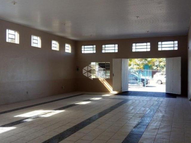Pavilhão à venda com 2 casas no terreno Pinheiro Machado Santa Maria