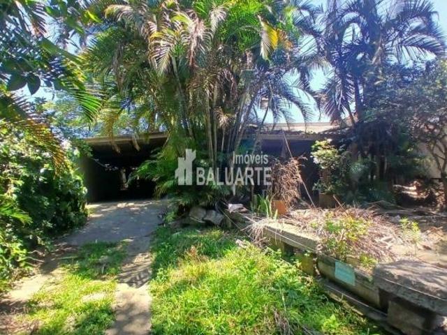 Pedreira: Terreno com área de 710 m² com uma casa térrea, 4 vagas