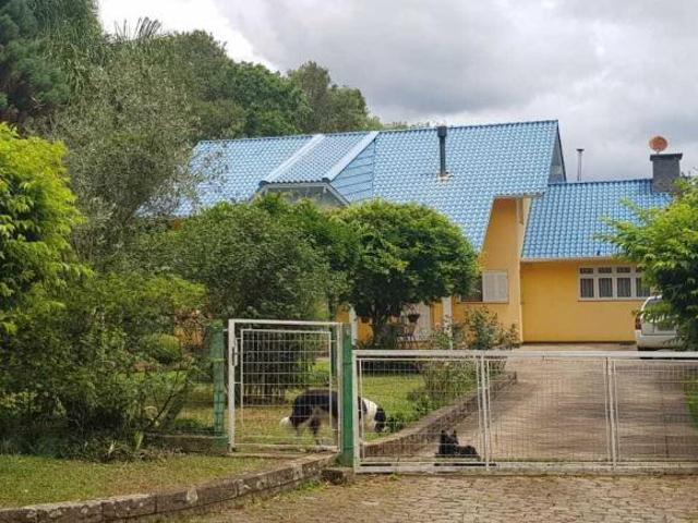 Pequena chácara com casa A VENDA