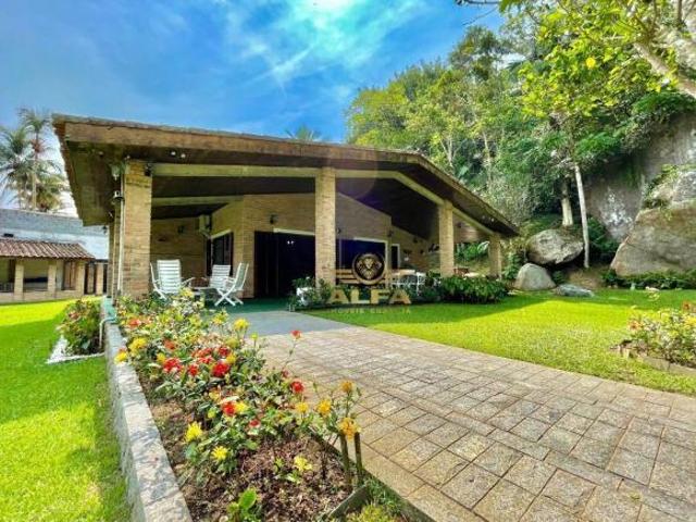 Perto da praia Casa à venda com 3 dormitórios Espaço gourmet 6 vagas Jardim Guaiuba Guaruj