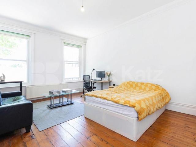 Perfectly located on Finchley Road, this four bedroomed flat boasts high ceilings and modern finishing