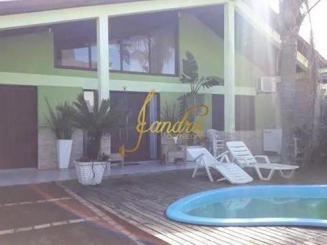 Perfeita casa para suas ferias em família! com 3 dormitórios com dois terrenos