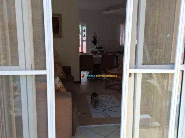 Permuta Village com 2 dormitórios 75 m² por R$ 700.000 Vila Clais Bertioga/SP
