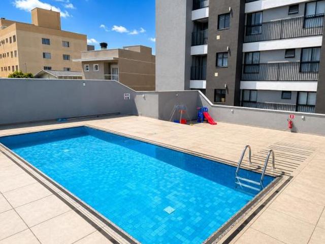 Pinheirinho Apart. 2 quartos varanda com churrasqueira 1 vaga coberta 42,81m2