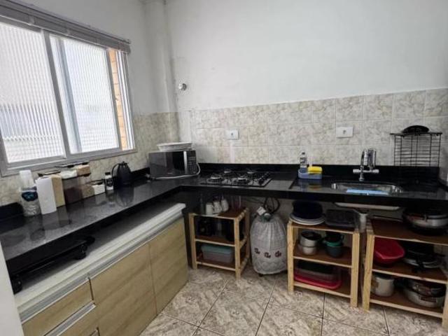 Porteira Fechada Apartamento mobiliado de 2 dormitórios com vista lateral para o mar
