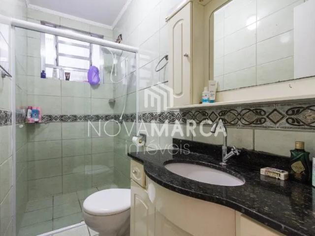 Nova Marca Imóveis vende apartamento de 2 dormitórios, vaga, bairro Menino Deus