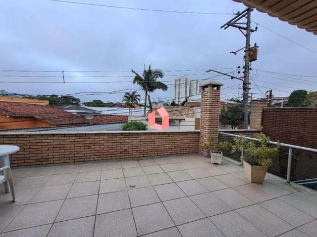 Pq.Espacial amplo Sobrado c/ 4 suites ampla,sala 2 ambientes c/ varanda,Cozinha espaçosa,garagem cob