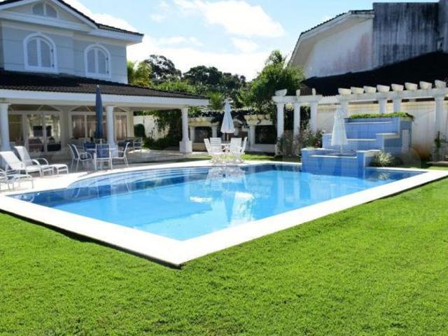 Projeto neoclássico americana no condomínio Jardim Acapulco