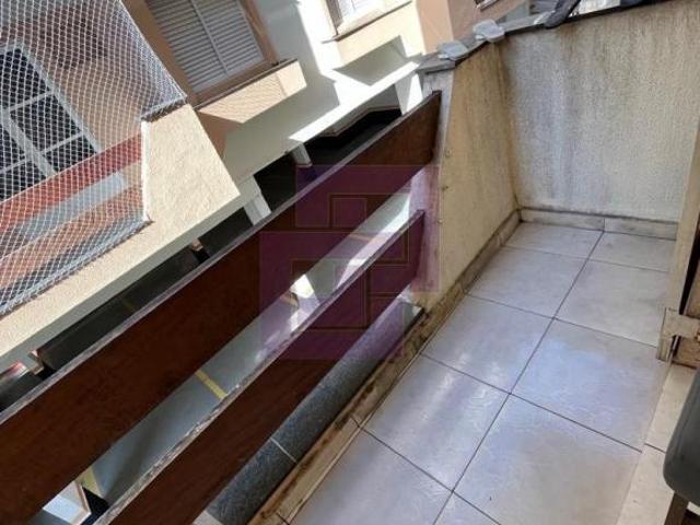 Praia da enseada 50 metros da praia, apartamento com 1 dormitorio, 2 banheiros, sala com varanda