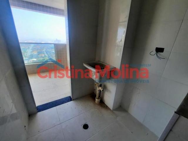 Praia Grande 2 Dorm. UMA SUÍTE, SACADA, SALA, COZINHA, ÁREA DE SERVIÇO, PRÉDIO COM ELEVADOR, PORTARI