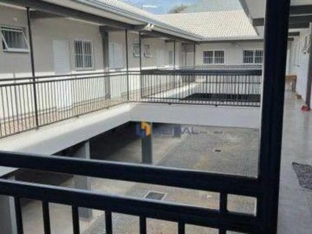 Prédio com 15 Kitnets, 2 salas comerciais e 16 garagens