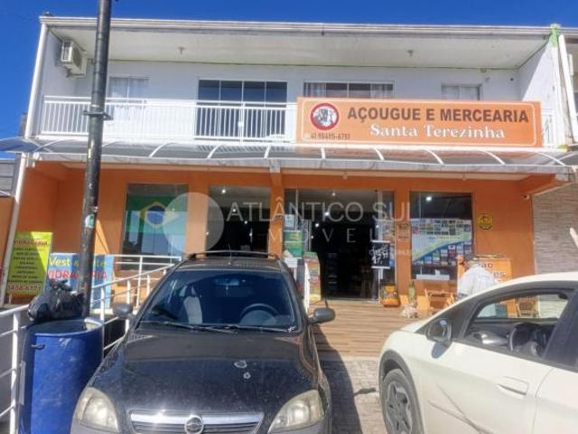 Prédio Comercial e Residencial frente rodovia principal de acesso a praia