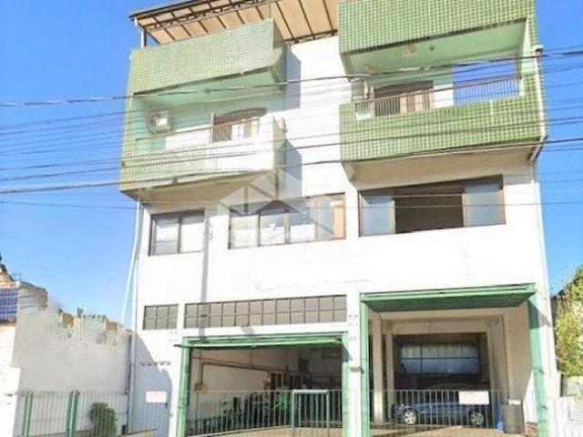 Prédio comercial e residencial na Baltazar