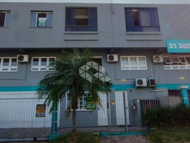Prédio Residencial com 3 apartamentos e 1 sala comercial no bairro Moinhos de Vento em Canoas
