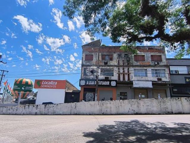 Prédio residencial com 4 apartamentos Centro Canoas para investidores