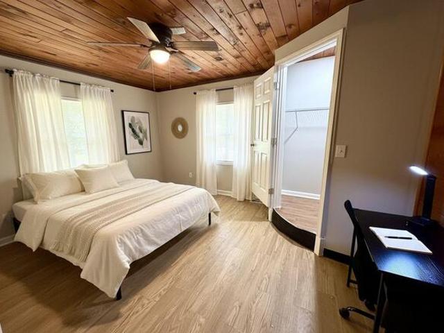 Premium All Inclusive Room Furnished Kitchen: Cook with ease. In Unit Laundry: Free weekly washing. Smart Locks: Top tier room security. Zero Bills: All utilities + Wi Fi covered