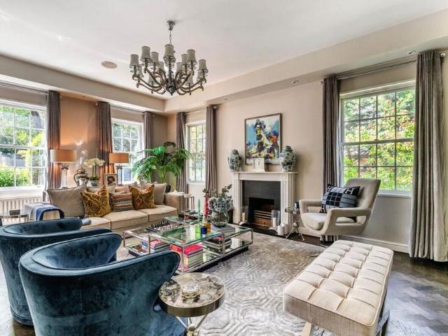 Presenting a detached gated family home