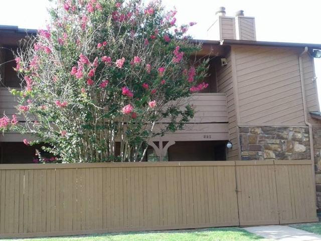 privacy fenced bottom unit with fireplace 1BedBath