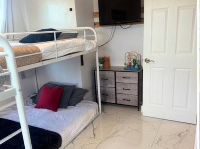 Private bunk bed room in large house with hot tub