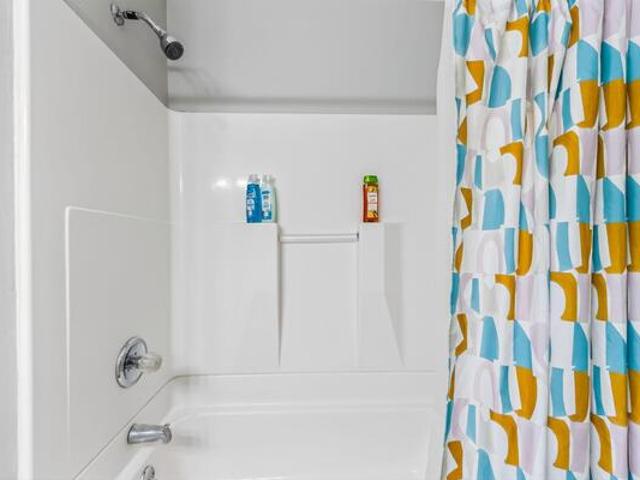 Private Bath in Every Room | 3 Minutes to UMKC | Spacious Suites & Fast Wi Fi