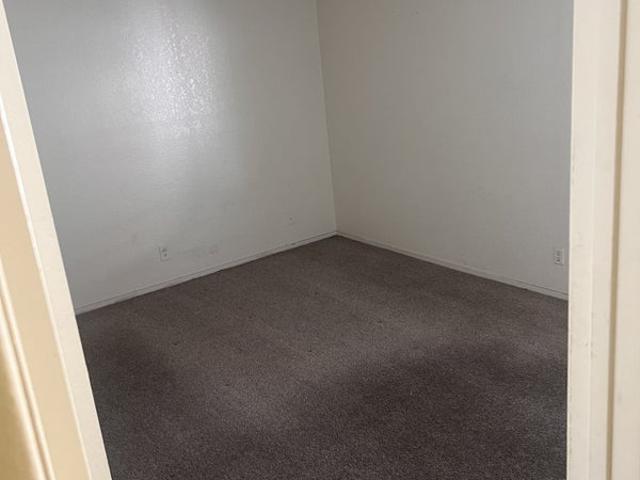 private bathroom, kitchen, balcony, & living room