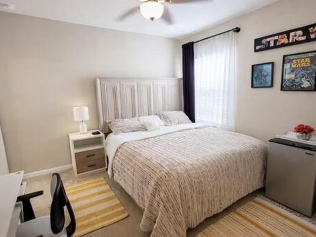 Private Bathrooms | Gated Kissimmee Resort Home | Smart TVs | Pool | Resort Hot Tub | Resort Gym | Wi Fi | Workspaces | Cold Plunge | Red Light Bed | PEMF Mat | Whole Body Vibration | Near Disney, Universal, SeaWorld & HWY 192