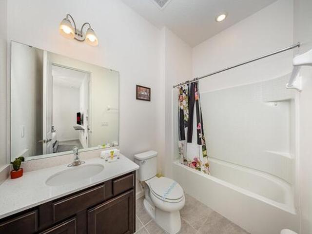 Private bathrooms | Kissimmee Resort Home | Smart TV in every room | Pool | Resort living | Close to 192, | Close to Disney Universal, Disney | Large Kitchen | Two Laundry Rooms | Smart locks