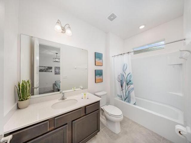 Private bathrooms | Kissimmee Resort Home | Smart TV in every room | Pool | Resort living | Close to 192, | Close to Disney Universal, Disney | Large Kitchen | Two Laundry Rooms | Smart locks