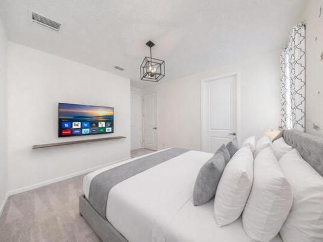 Private bathrooms | Kissimmee Resort Home | Smart TV in every room | Pool | Resort living | Close to 192, | Close to Disney Universal, Disney | Large Kitchen | Two Laundry Rooms | Smart locks