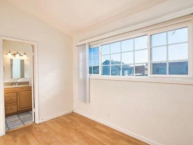 Private bedroom and private bathroom across the st