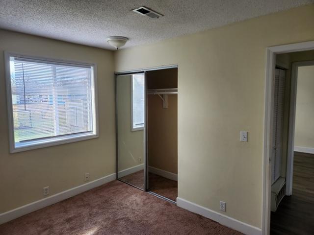 Private Bedroom in Quiet Lawrence Townhome Near KU Shared Utilities and Pet Friendly