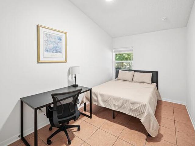 Private, fully furnished room in a clean, quiet Palm Coast home with all utilities included — ideal for working professionals