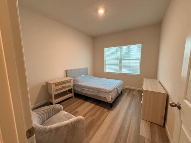 Private furnished room with parking close to beach