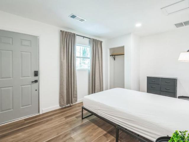 Private Queen Rooms • Work Desk • All Utilities I