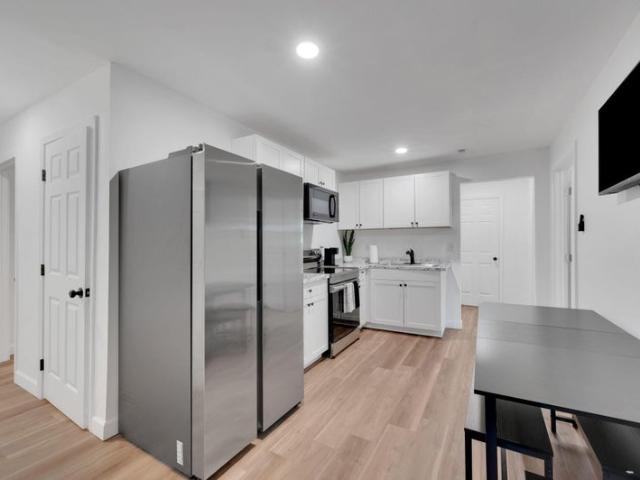 Private Queen Rooms • Workspaces • Parking • Quiet
