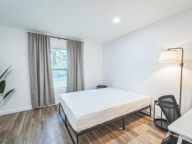 Private Queen Rooms • Workspaces • Parking • Quiet, Clean, Respectful Home
