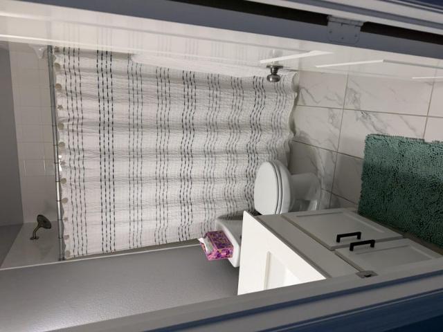 Private room, bathroom, and living room space