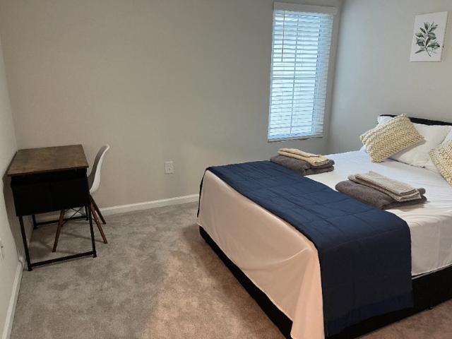Private room with shared bath in a townhouse. Full