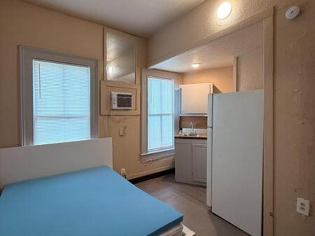 Private Studio Units | In Unit Kitchenette + En Suite Bath | Full Size Fridge | Under 1 Mile to UF Health