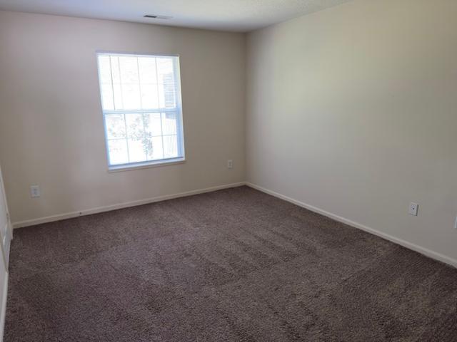 Private unfurnished bedroom with walk in closet and private bathroom available in a quiet cat friendly apartment