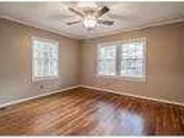 PRICE REDUCED! 2 Bedroom 1 Batha Home with Hardwood Floors Throughout!