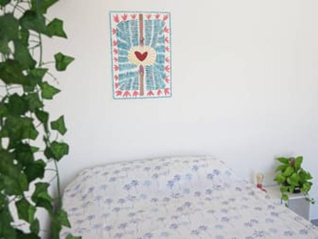 Quarto com banheiro compartilhado